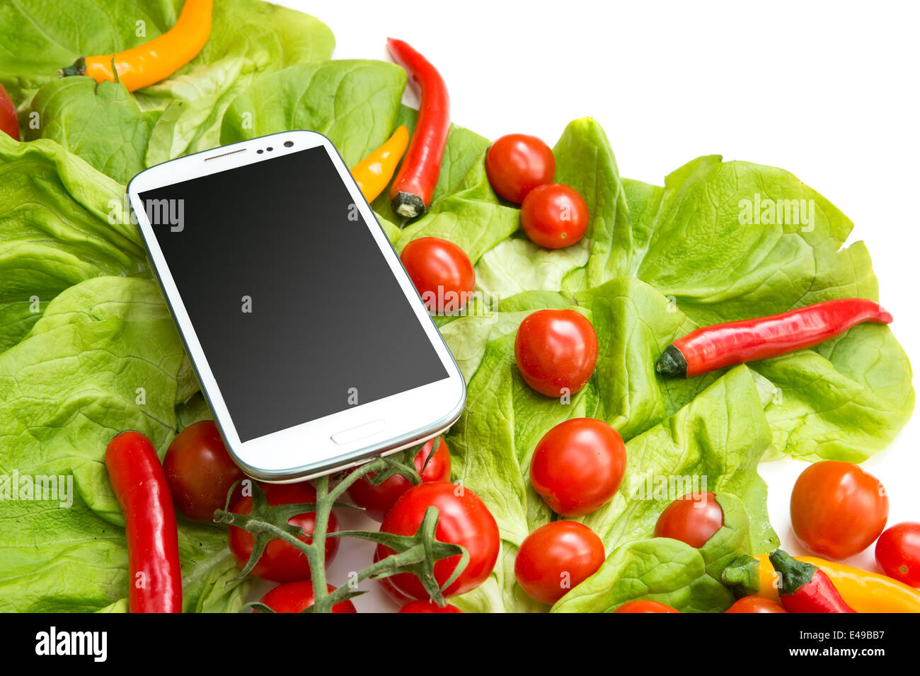 Various vegetables with a Smartphone Stock Photo - Alamy
