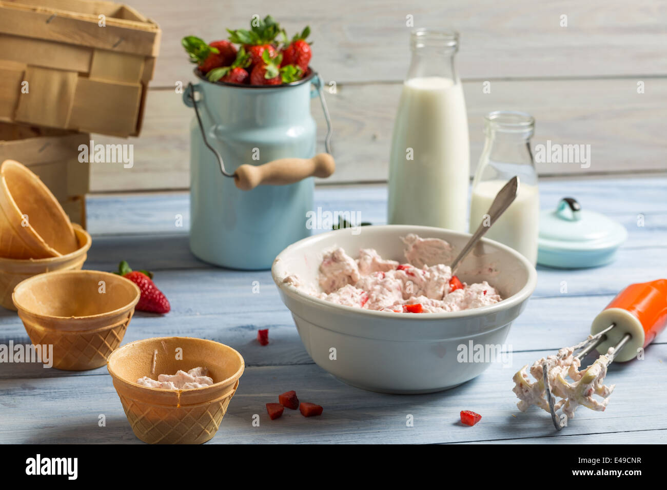 Homemade production of strawberry ice cream Stock Photo - Alamy