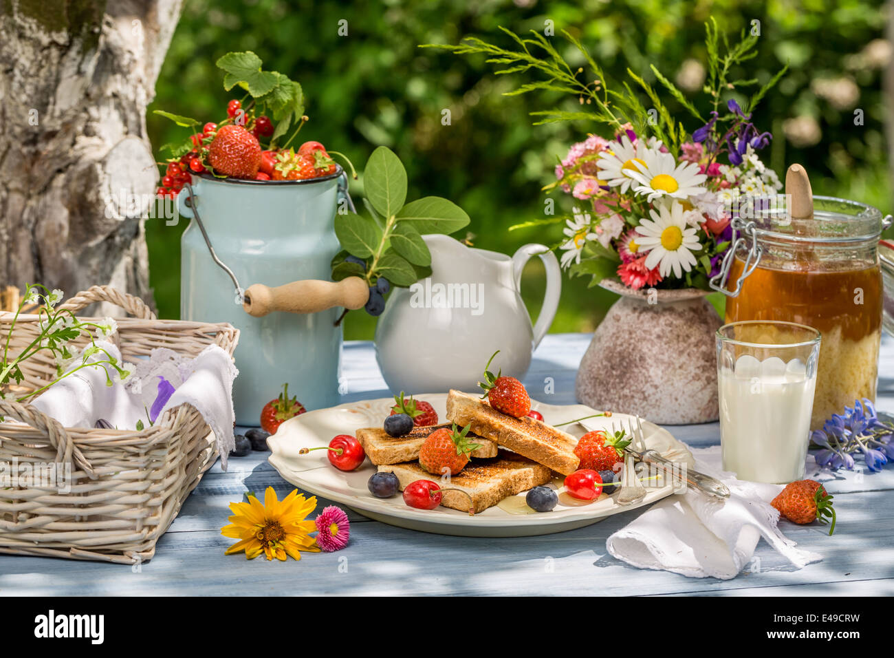 Summer breakfast in the garden Stock Photo - Alamy