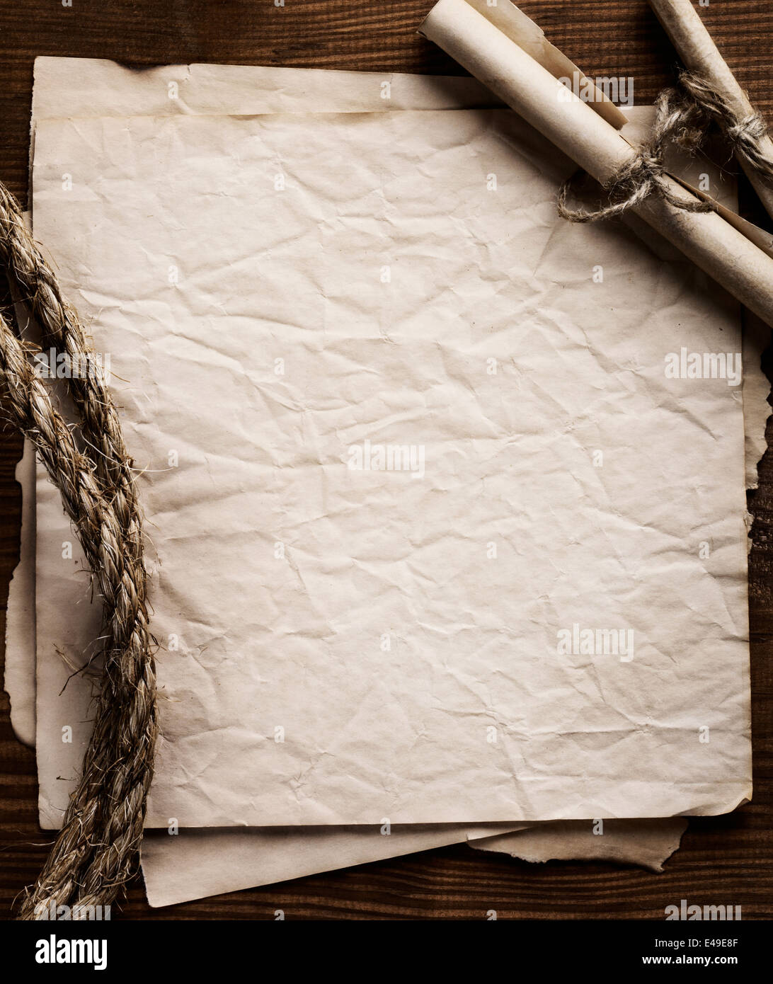 aged Rope on the old paper background Stock Photo - Alamy