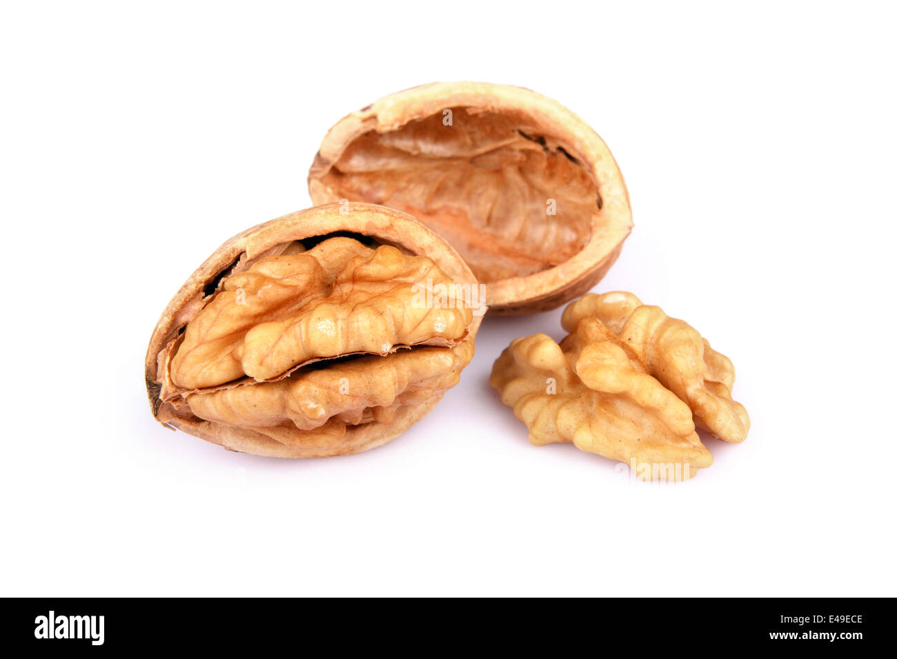Cracked Walnut isolated on white background Stock Photo - Alamy