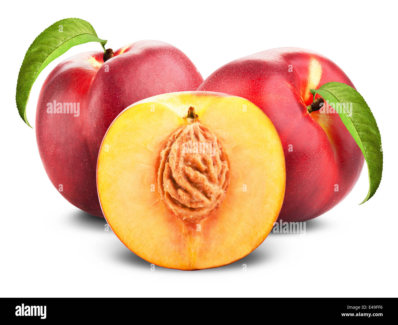 Three ripe nectarine fruits with slices isolated on white background ...