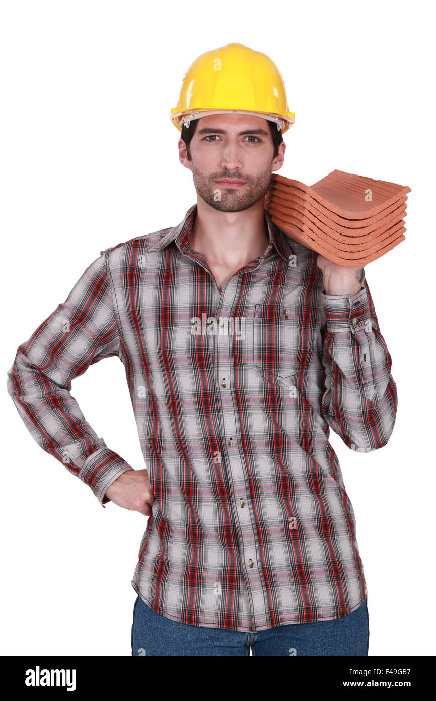 Man tiling roof hi-res stock photography and images - Alamy