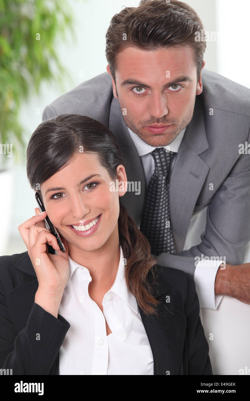 Portrait of an executive couple Stock Photo - Alamy