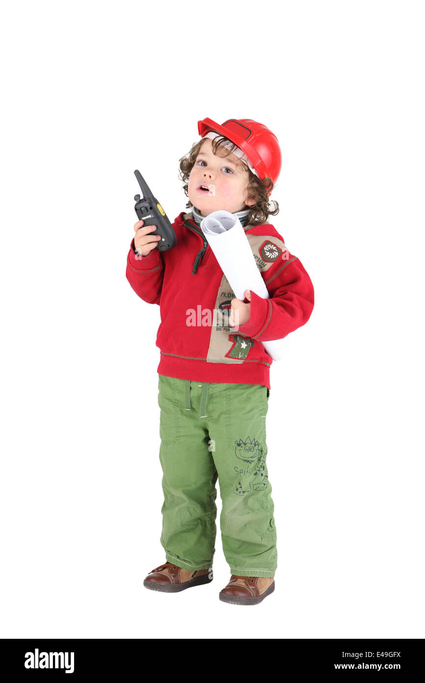 Little boy playing builder Stock Photo - Alamy