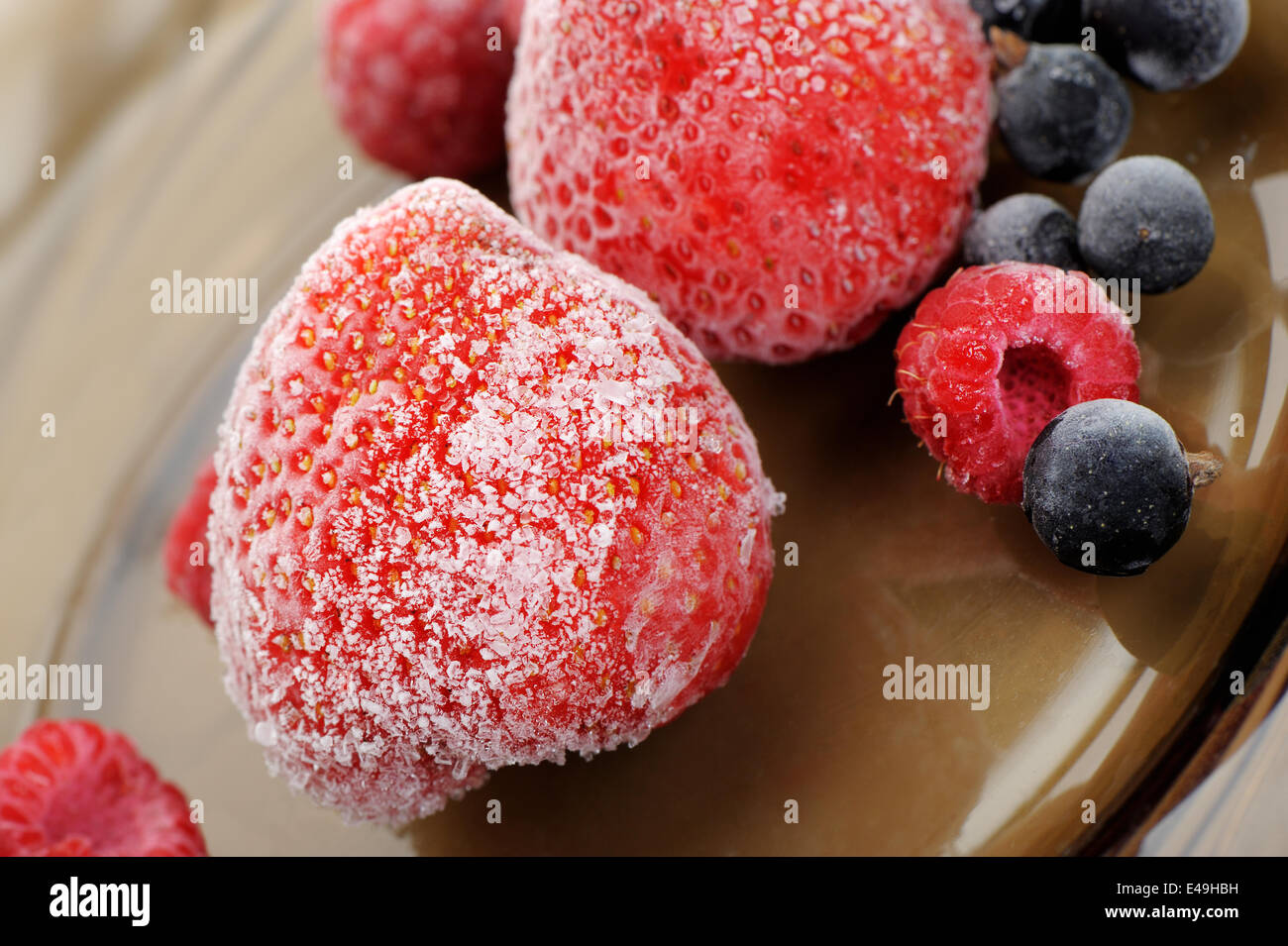 The frozen raspberry, strawberry, bilberry Stock Photo - Alamy