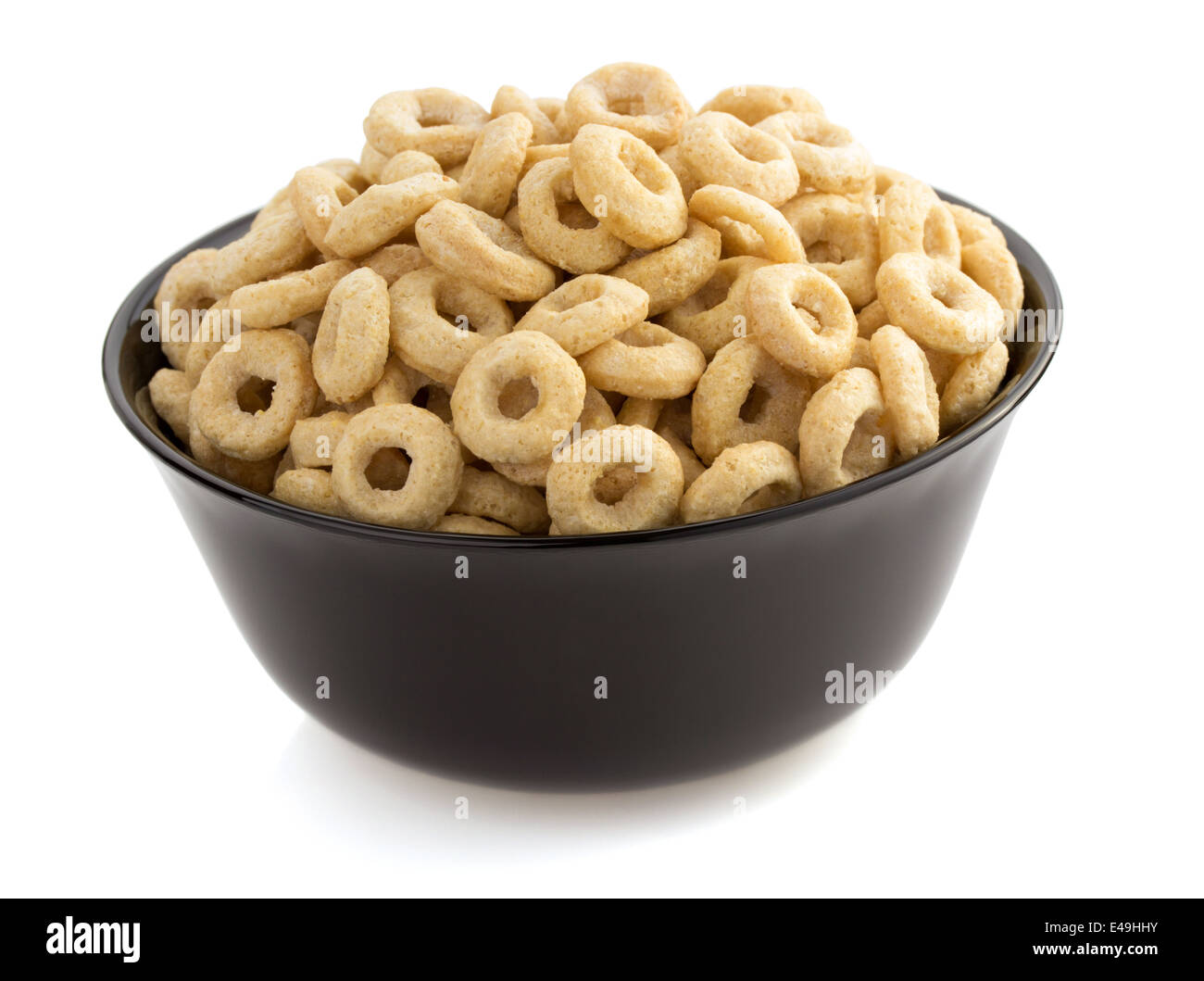 corn flakes rings in bowl isolated on white background Stock Photo - Alamy