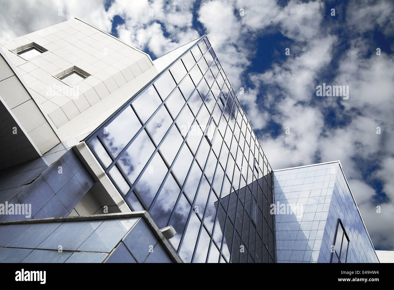 windows of skyscraper with reflections Stock Photo - Alamy