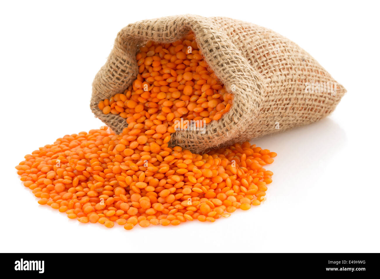 lentil in sack bag on white background Stock Photo - Alamy