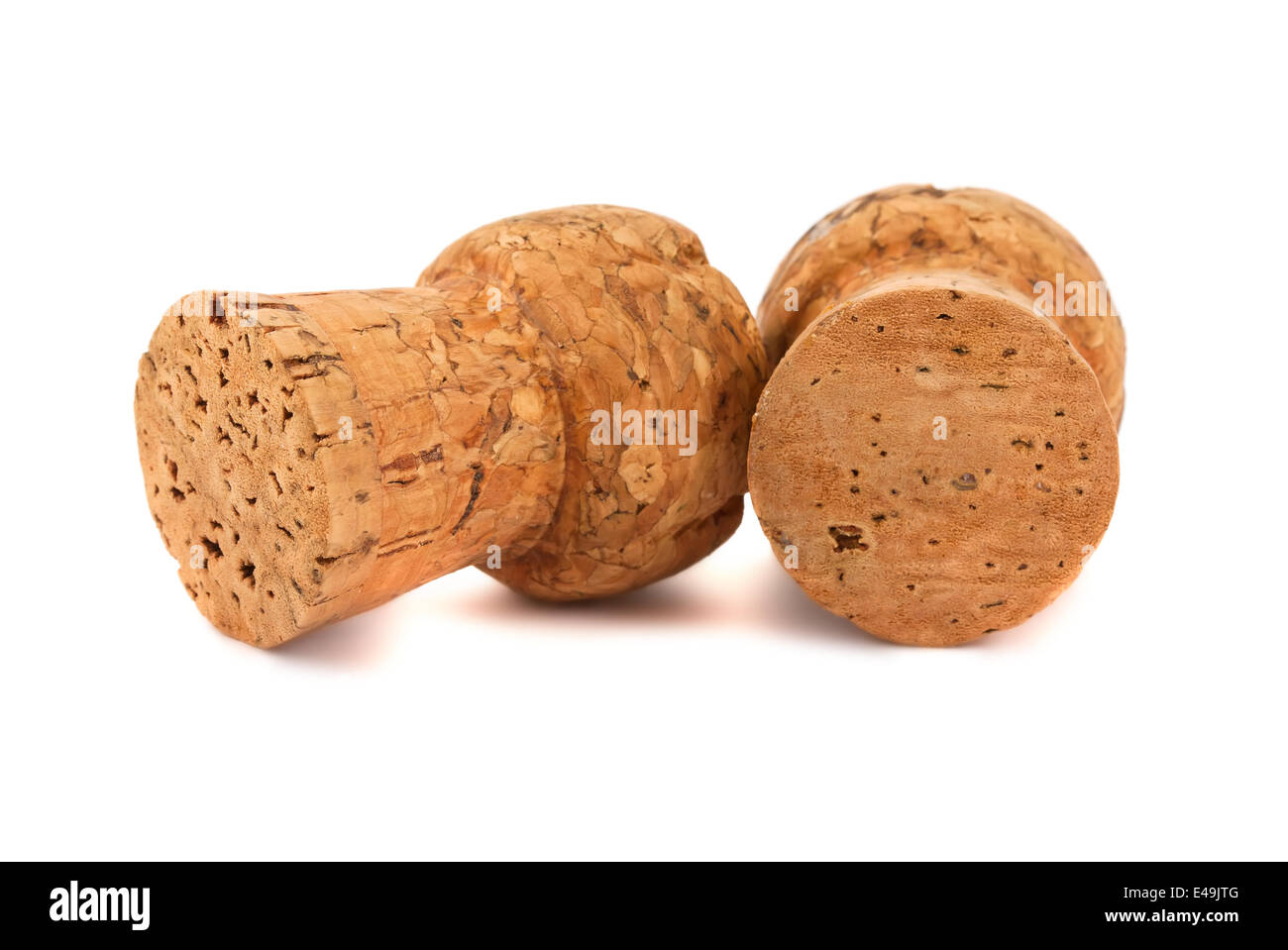 Corks on white background Stock Photo - Alamy
