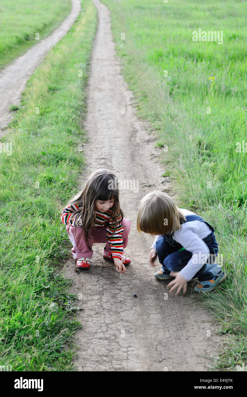 Children on road Stock Photo - Alamy
