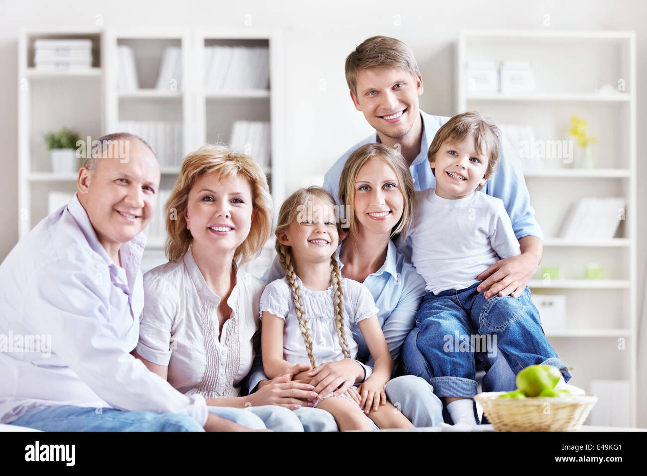Family at home Stock Photo - Alamy