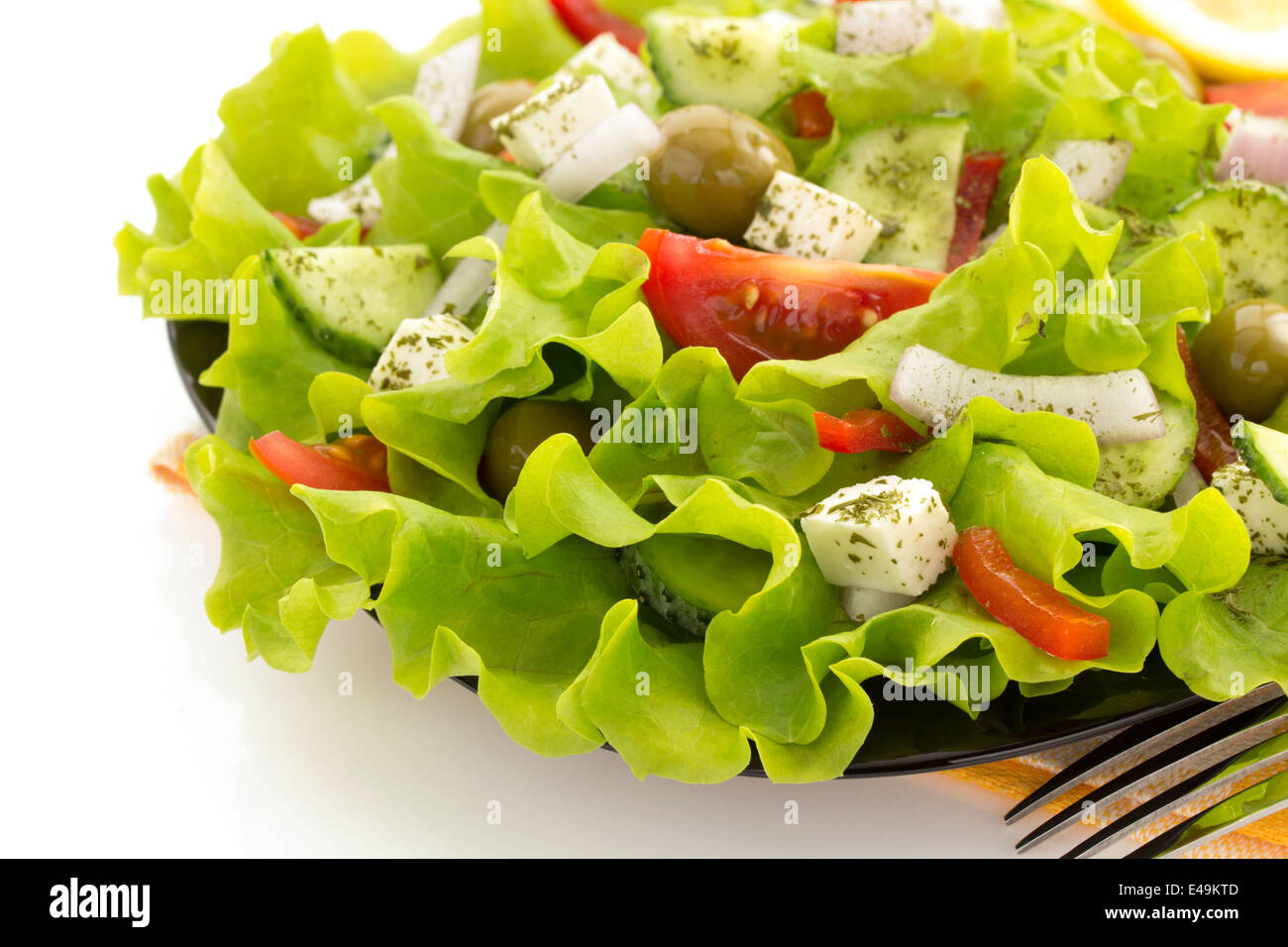 salad in plate isolated on white background Stock Photo - Alamy