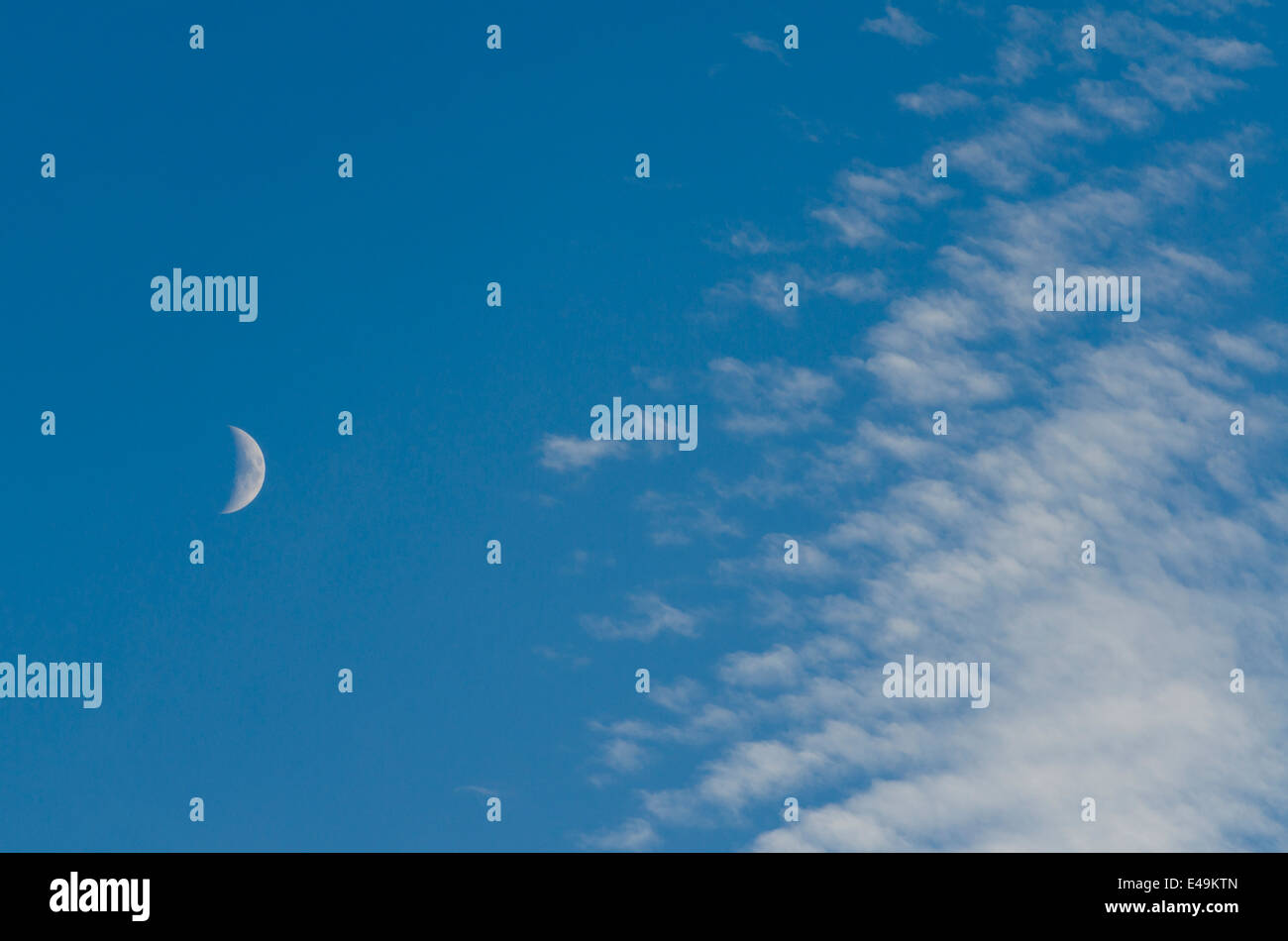 Half moon in a beautiful blue sky Stock Photo - Alamy