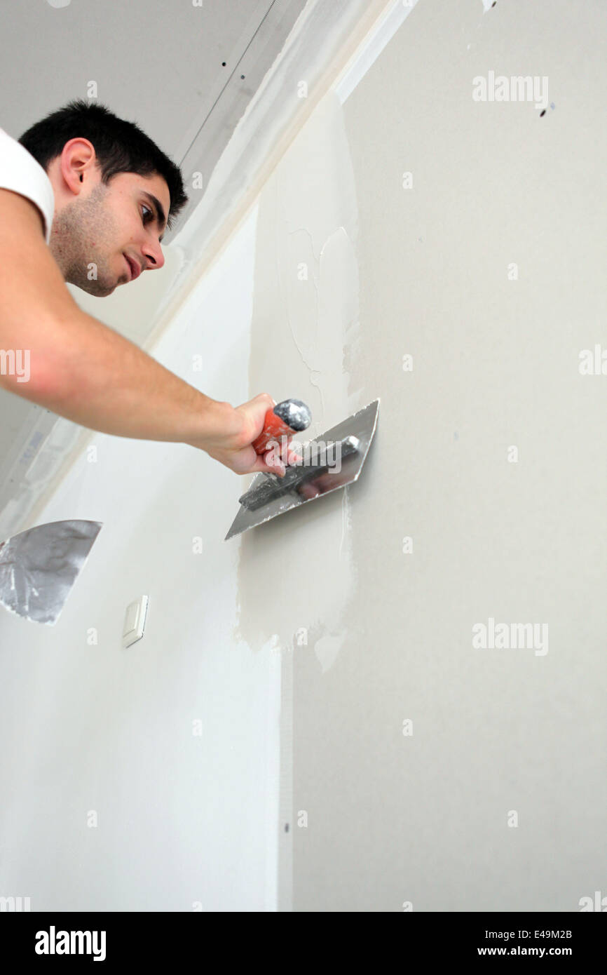Plasterer at work Stock Photo - Alamy