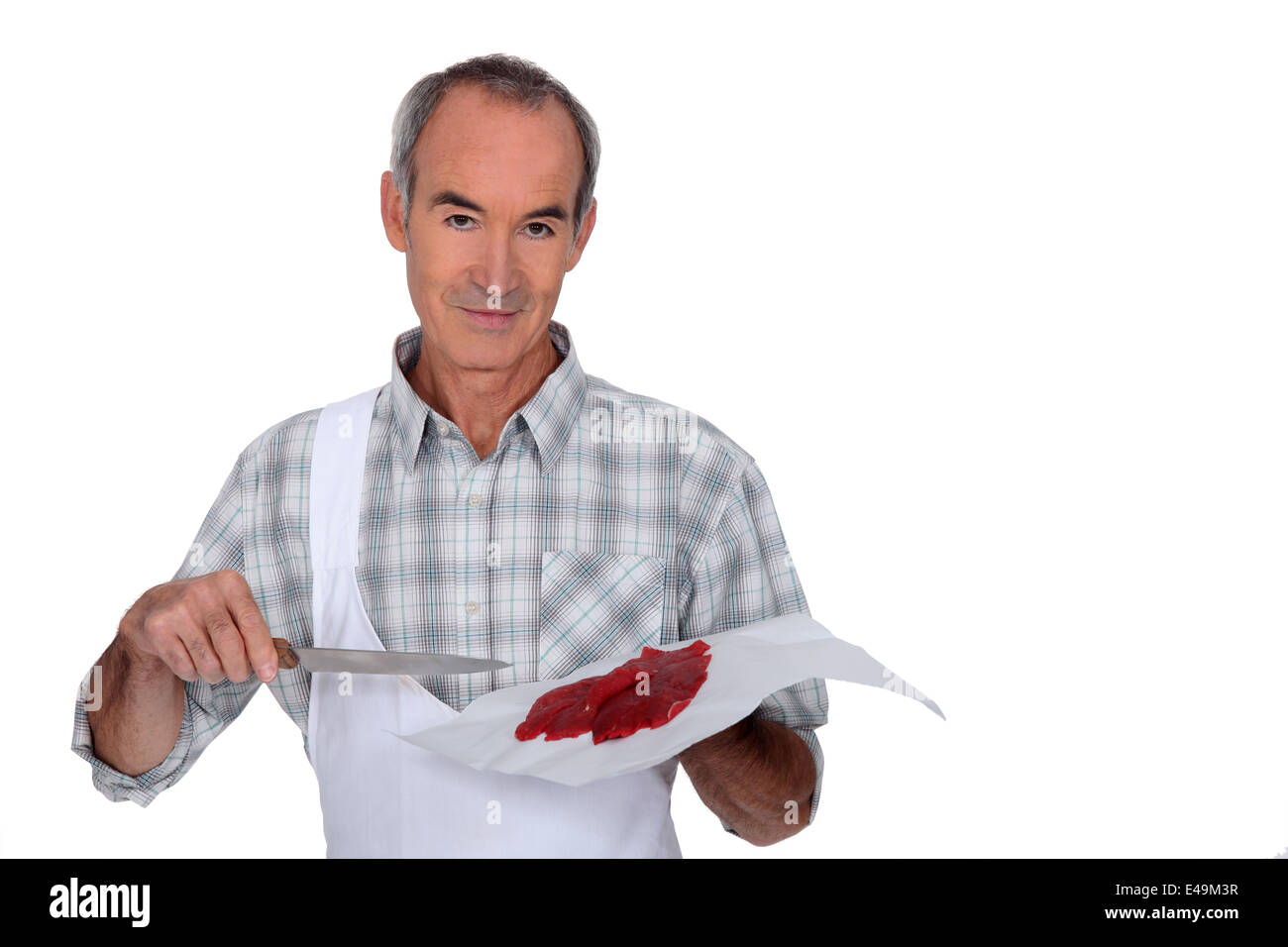 butcher cutting fresh meat Stock Photo - Alamy