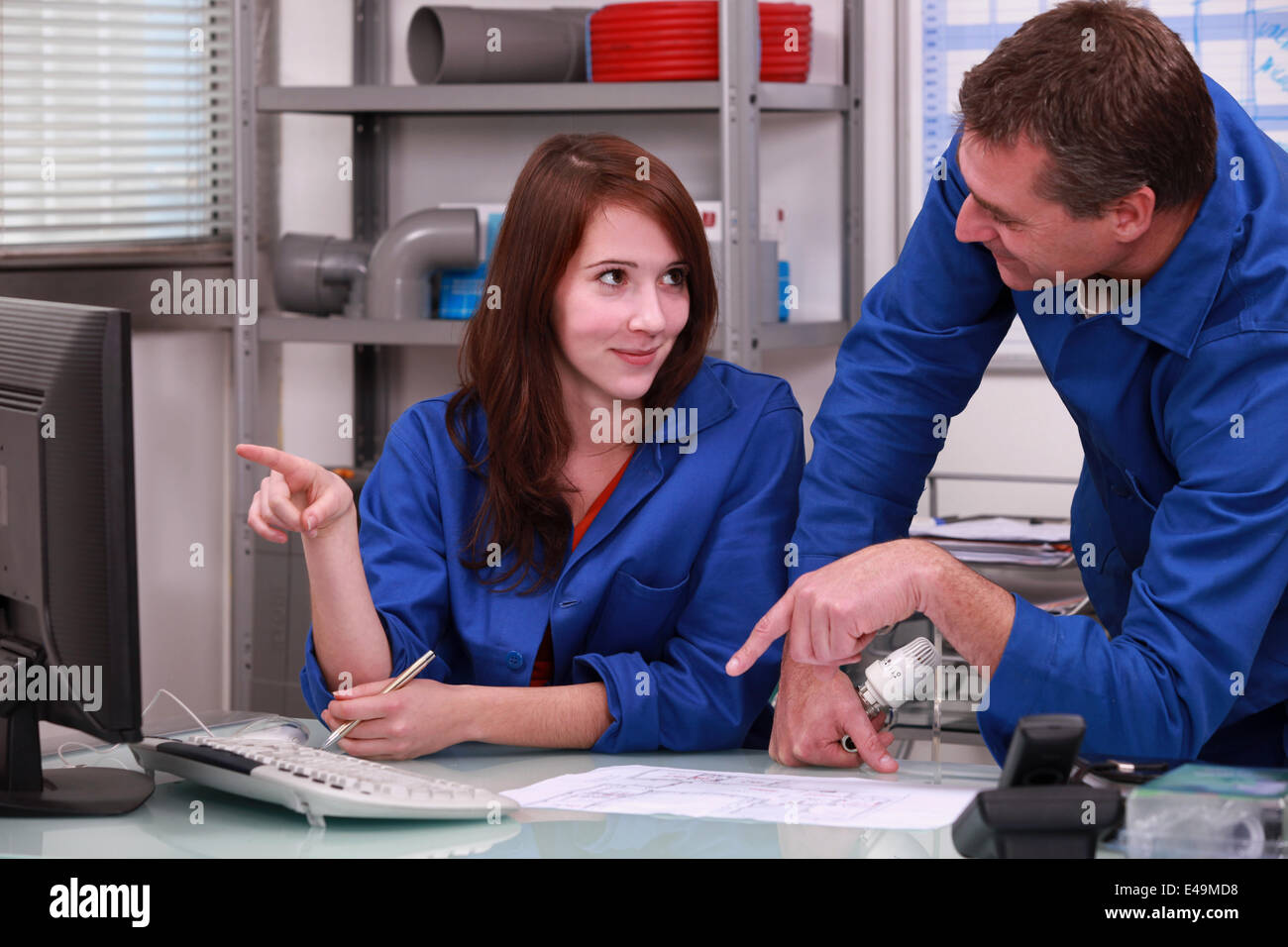 Boss and employee in office Stock Photo - Alamy