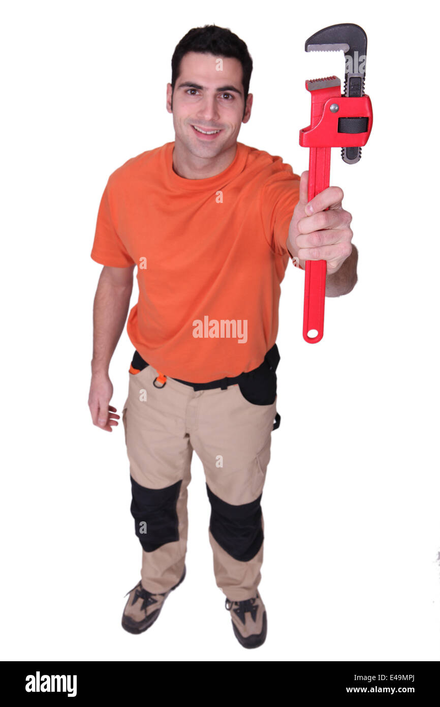 Man with wrench Stock Photo - Alamy
