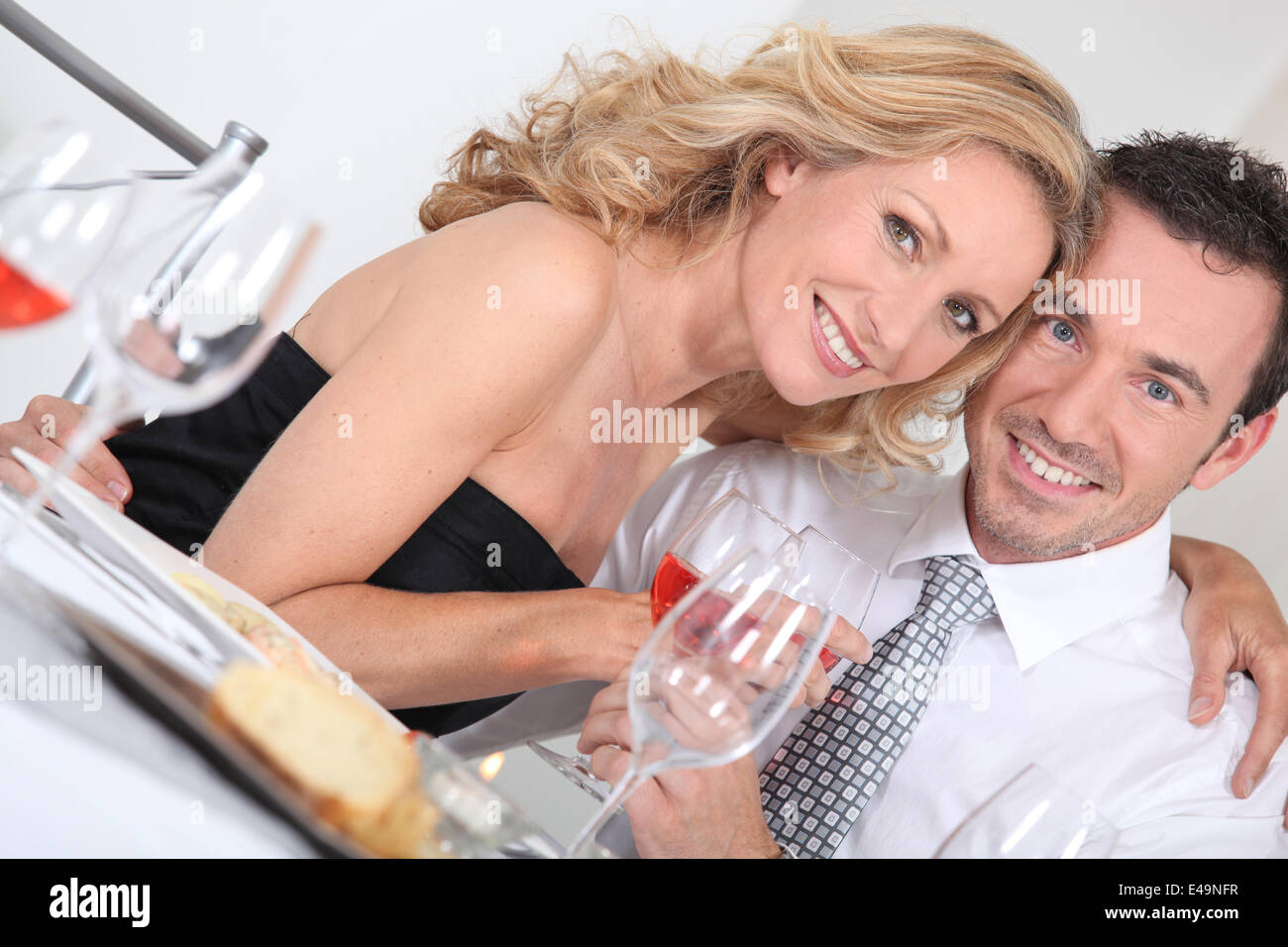 couple at table Stock Photo - Alamy