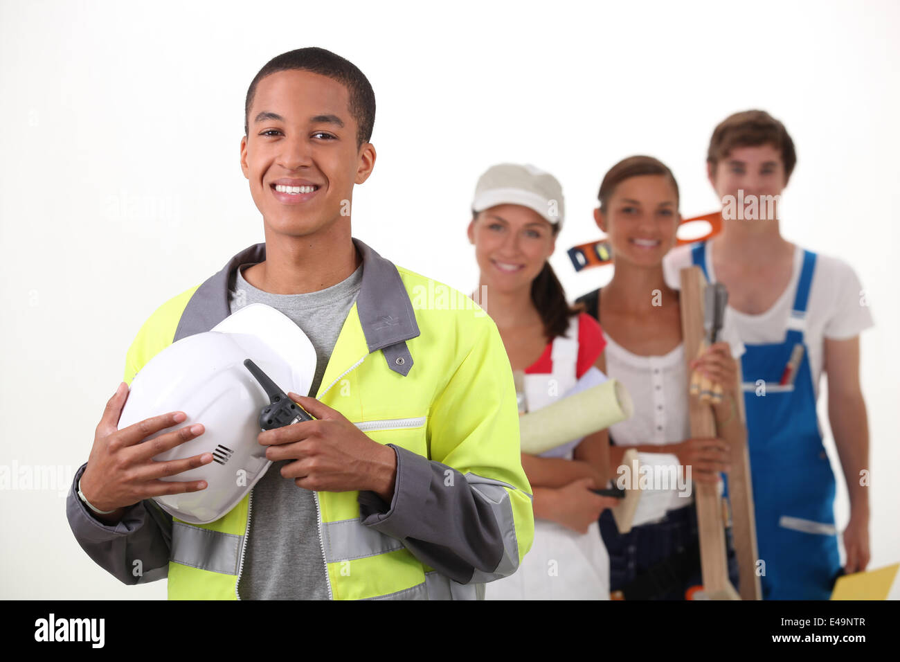 group of workers smiling Stock Photo - Alamy