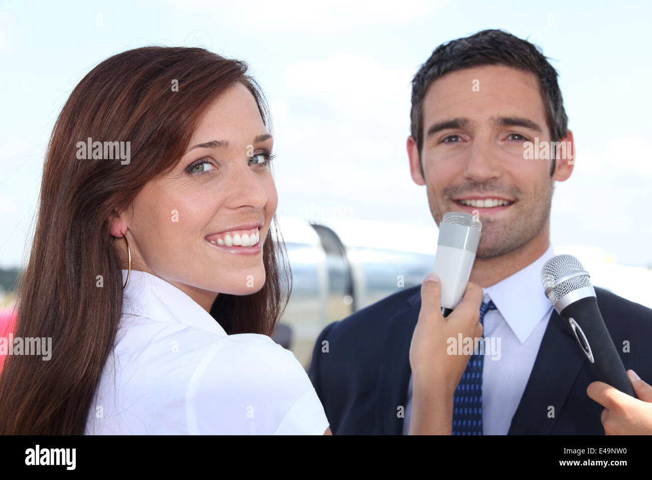 Man talking to journalists Stock Photo - Alamy