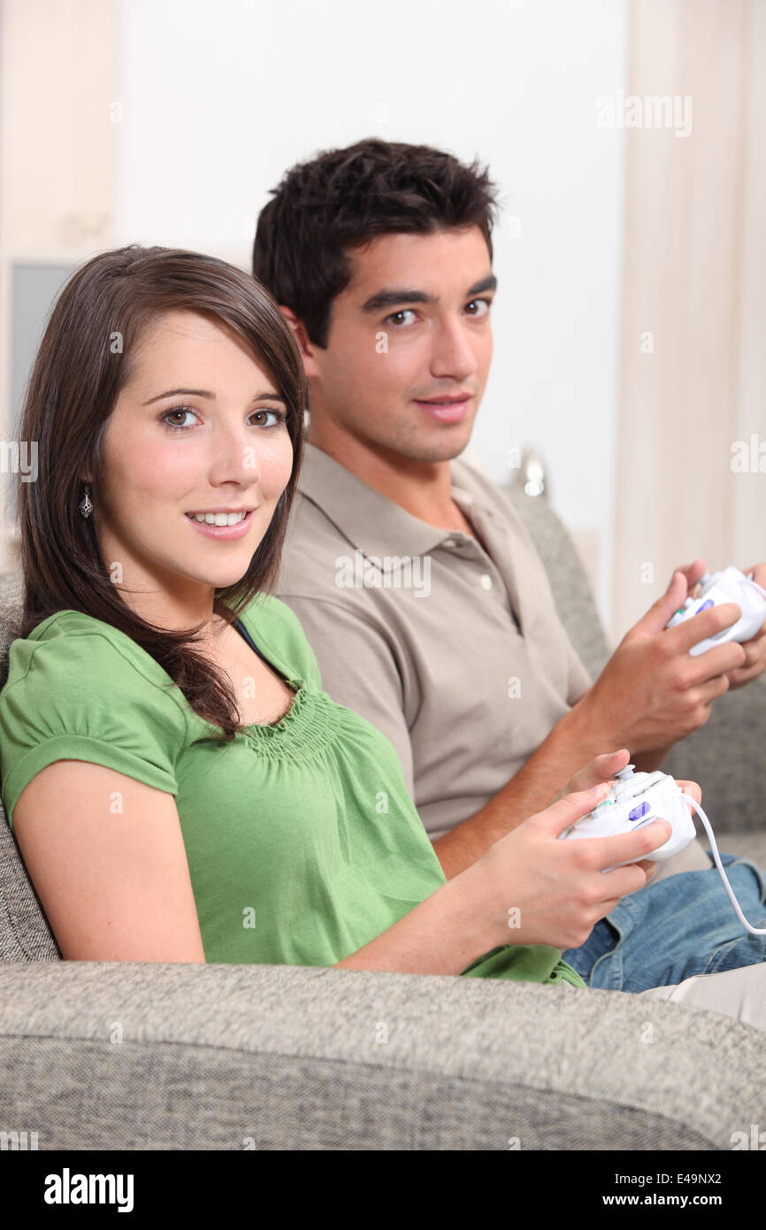 young people playing video games Stock Photo - Alamy