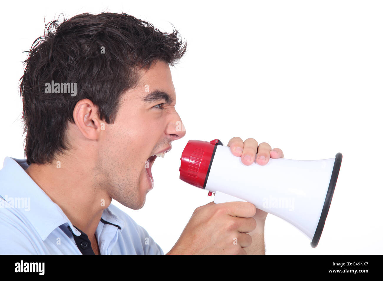 Man screaming into a megaphone Stock Photo - Alamy