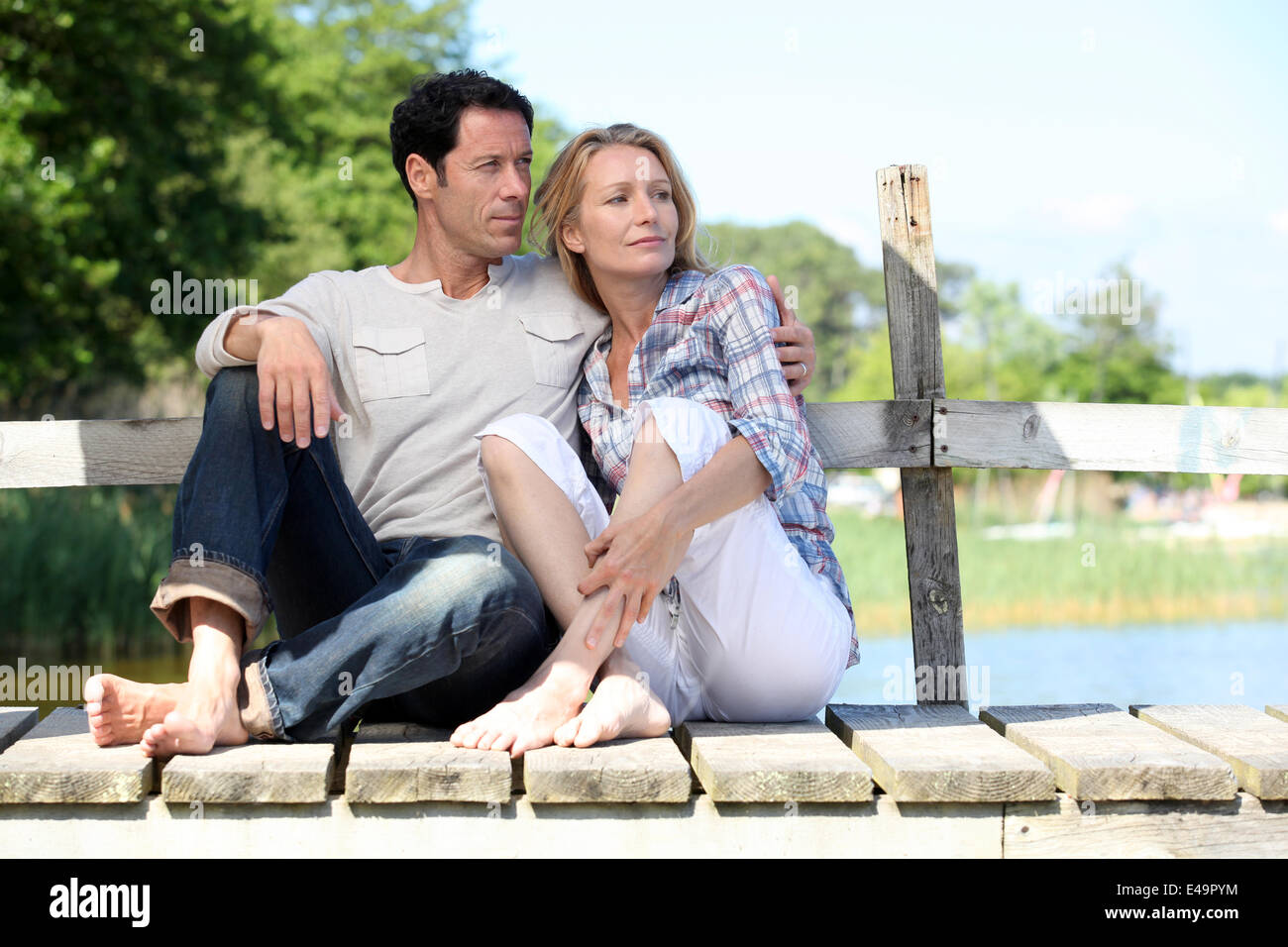 couple on pontoon Stock Photo - Alamy