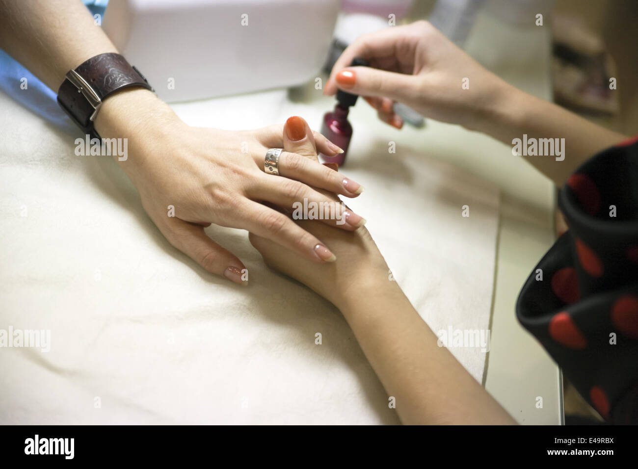 manicure treatment of female hands Stock Photo - Alamy