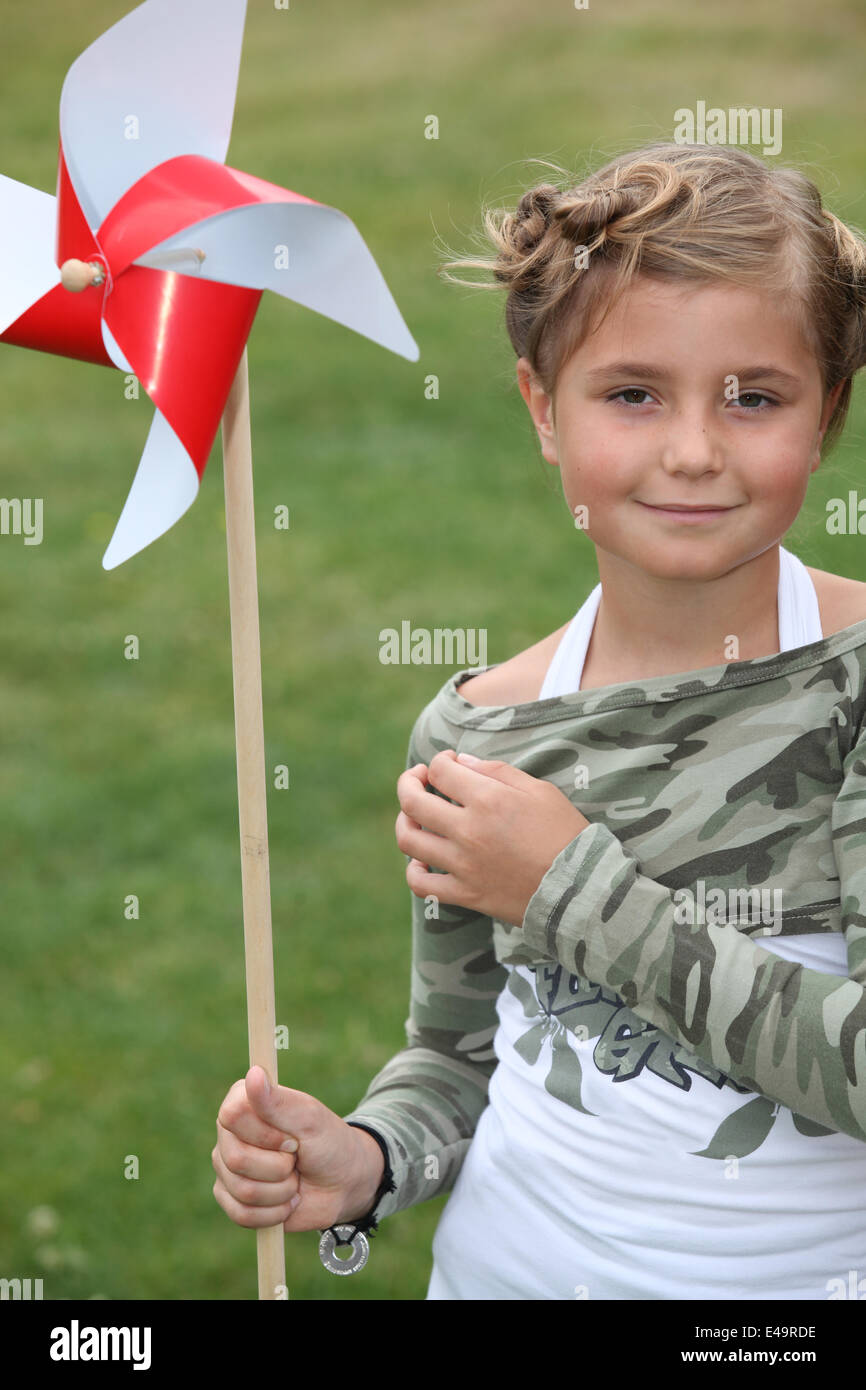 little girl and a paper windmill Stock Photo - Alamy