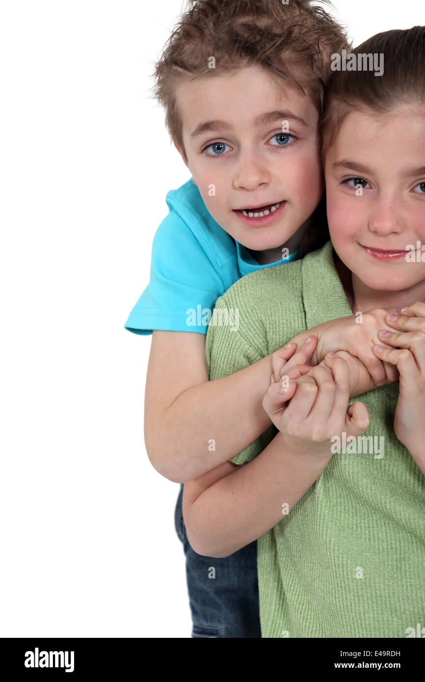 Two children brown eyes and blue eyes hi-res stock photography and ...