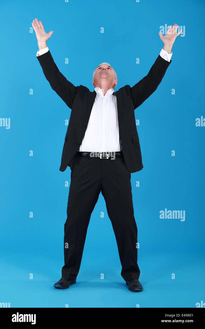 Cheerful guy raise hands hi-res stock photography and images - Alamy