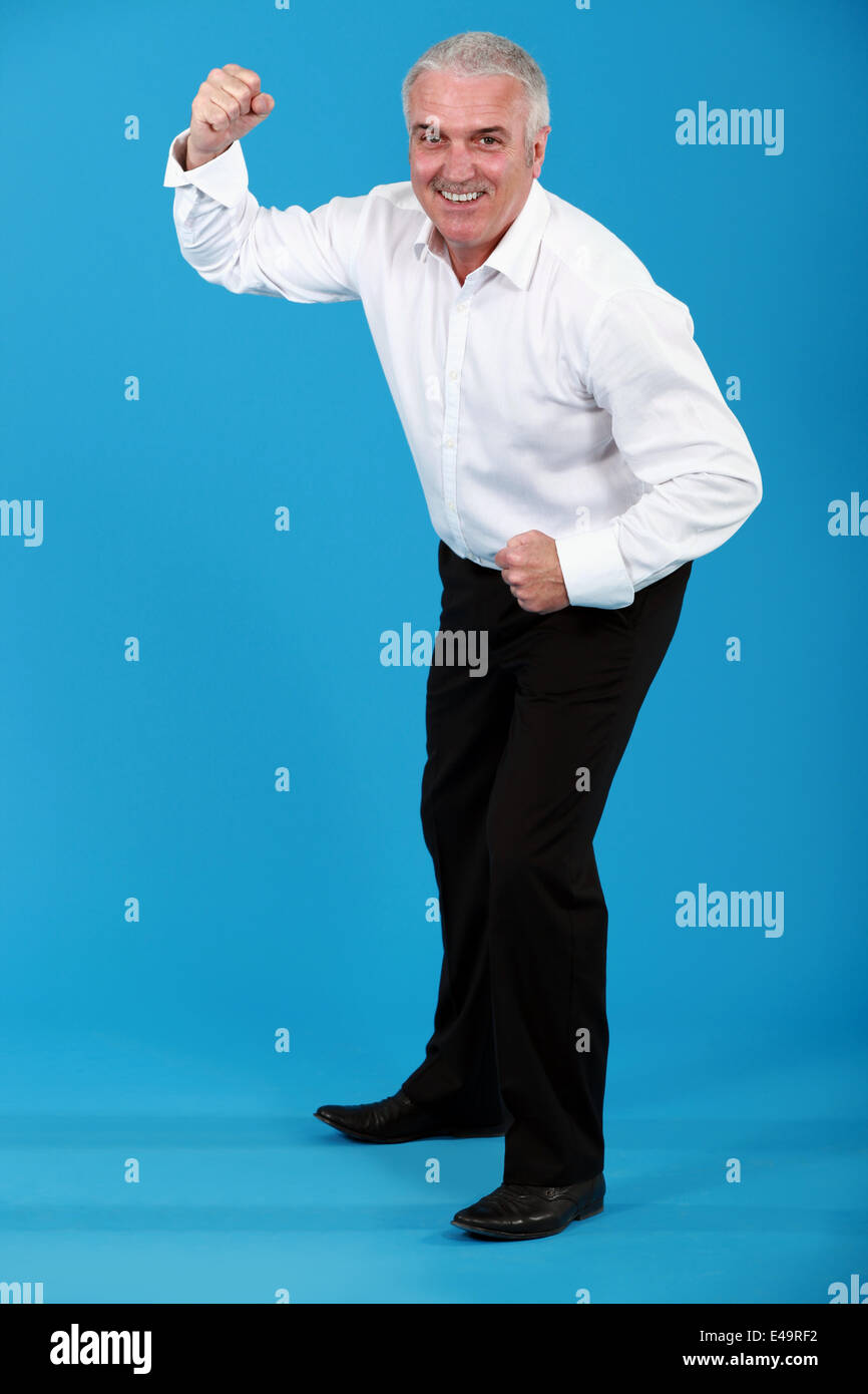 man in a suit dancing Stock Photo - Alamy