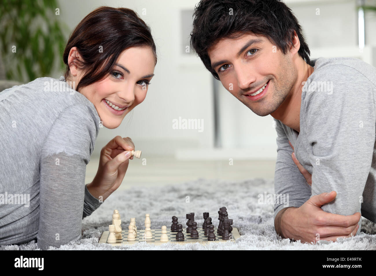 A couple playing chess Stock Photo - Alamy