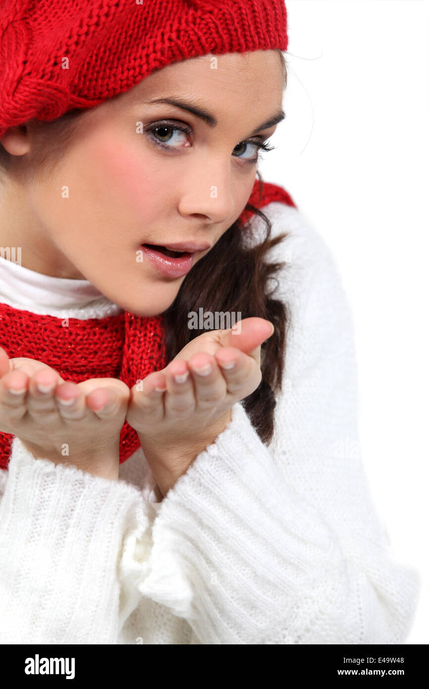woman blowing kisses in air Stock Photo - Alamy
