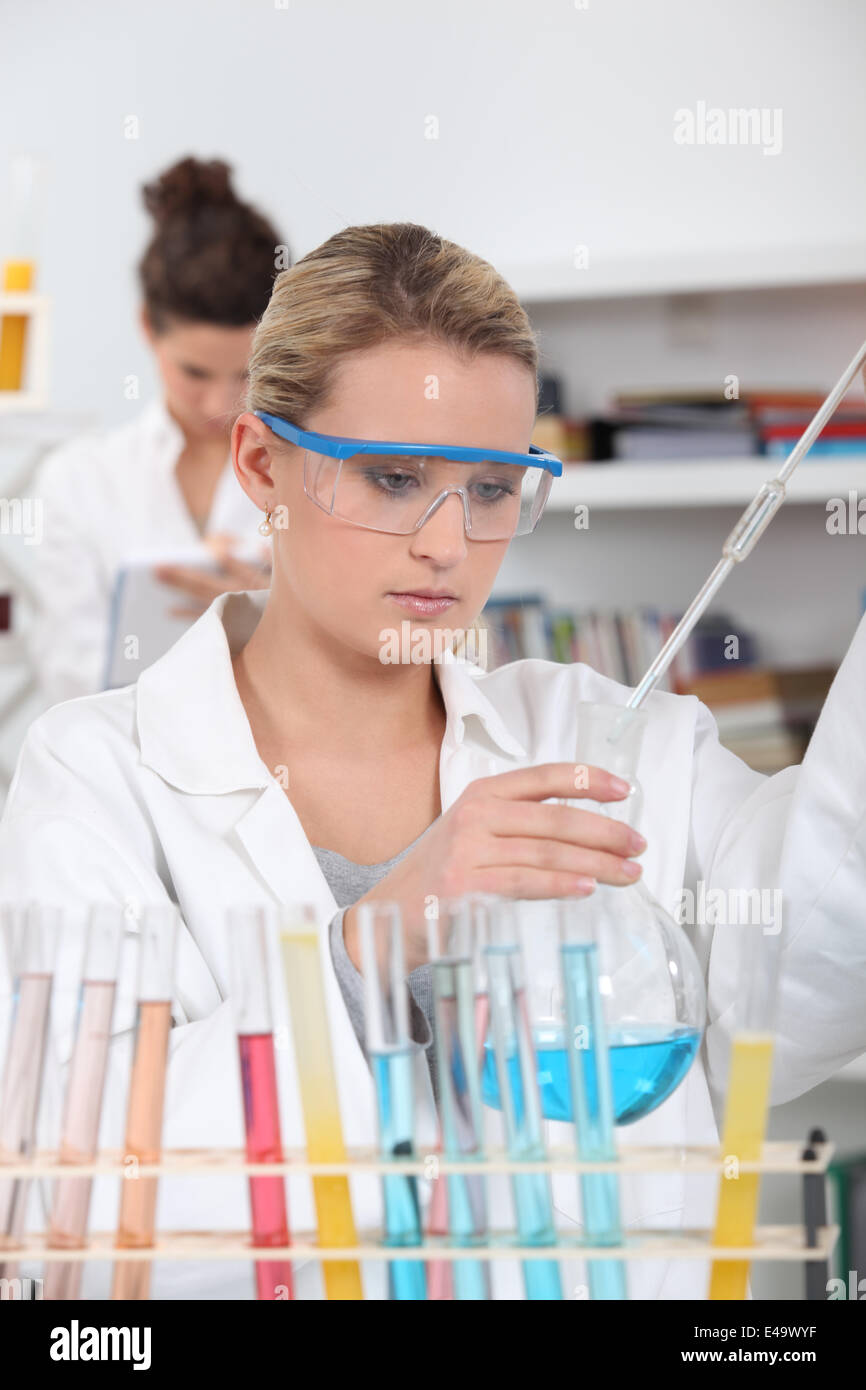 Woman working in a laboratory Stock Photo - Alamy