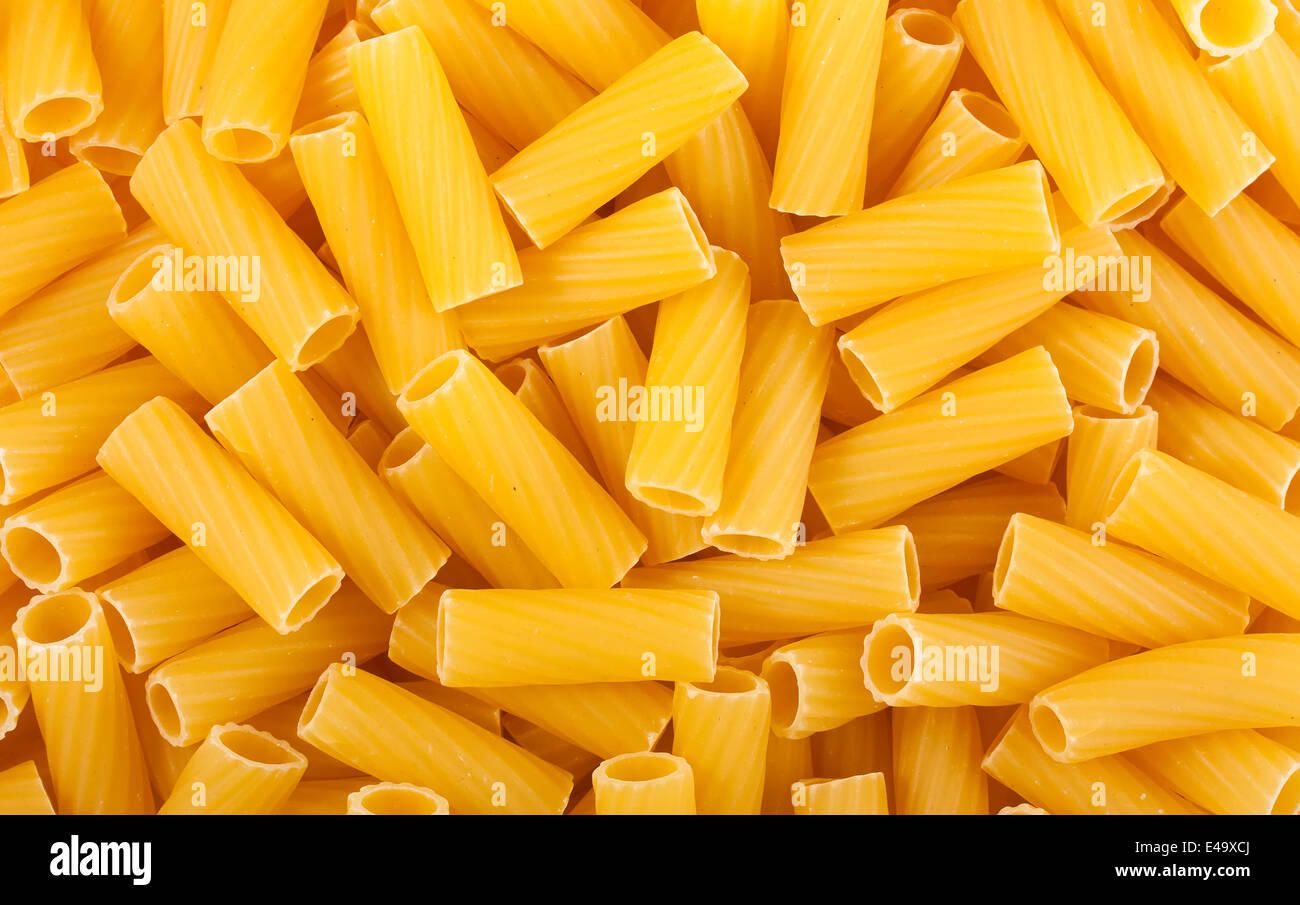 Full background of dry uncooked pasta hi-res stock photography and ...