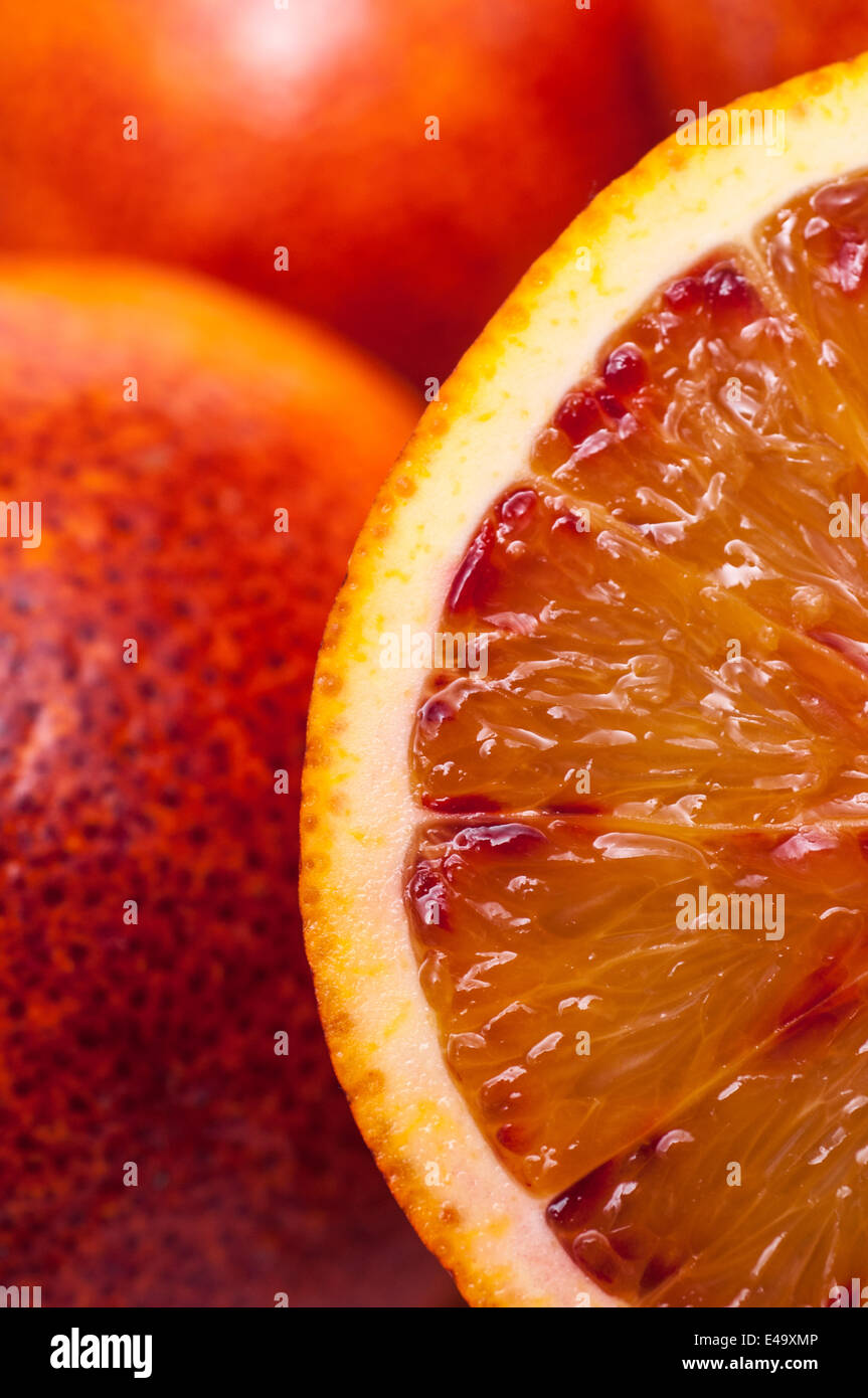 Slice of a blood orange Stock Photo - Alamy
