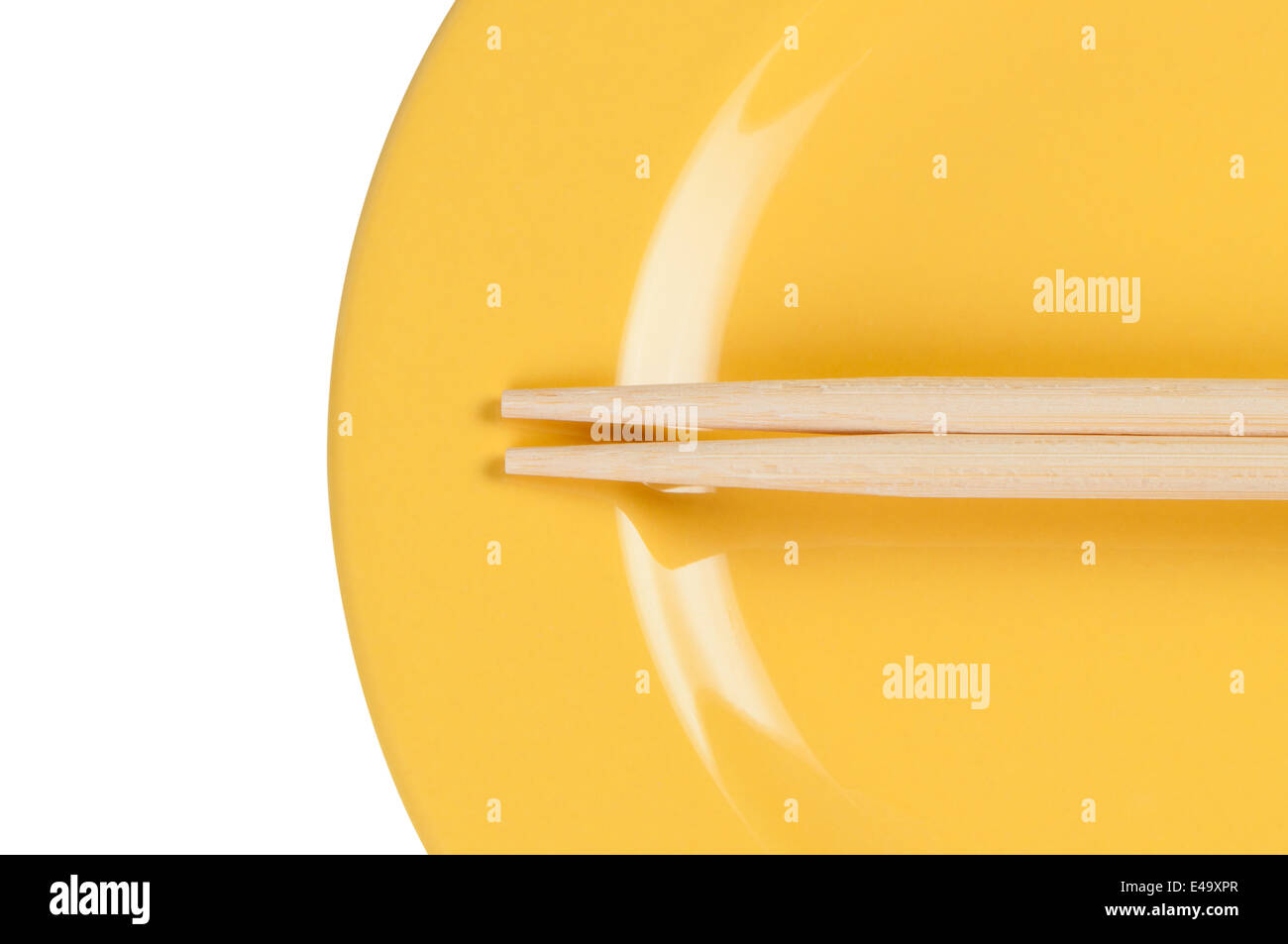 Plate with chopsticks Stock Photo - Alamy