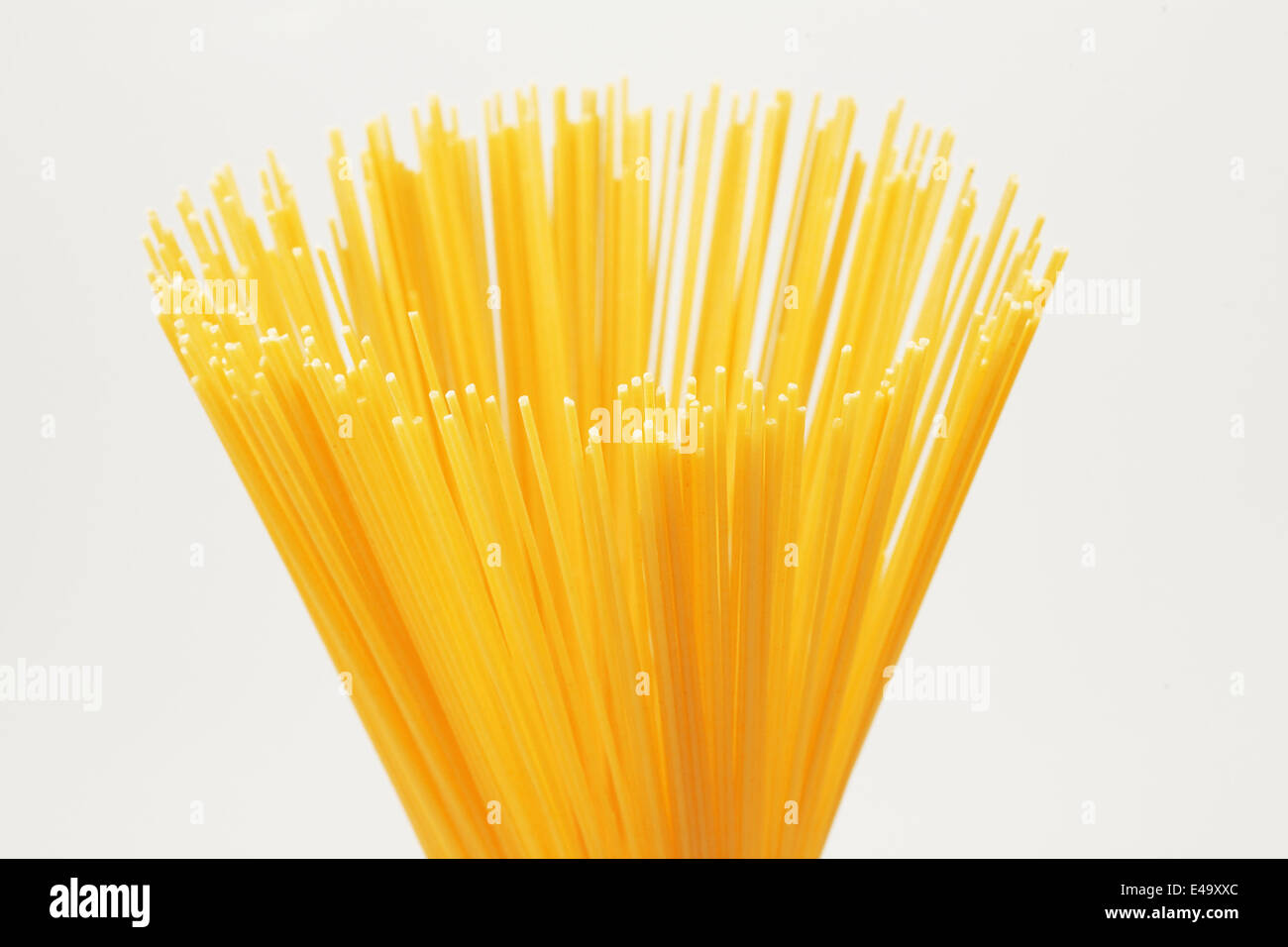 Bunch brightly yellow a spaghetti Stock Photo - Alamy