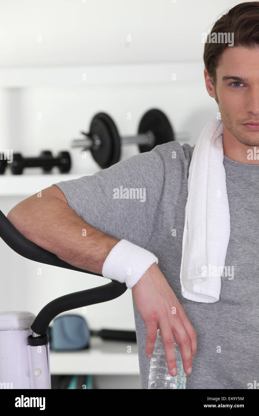 Man taking a break at the gym Stock Photo - Alamy