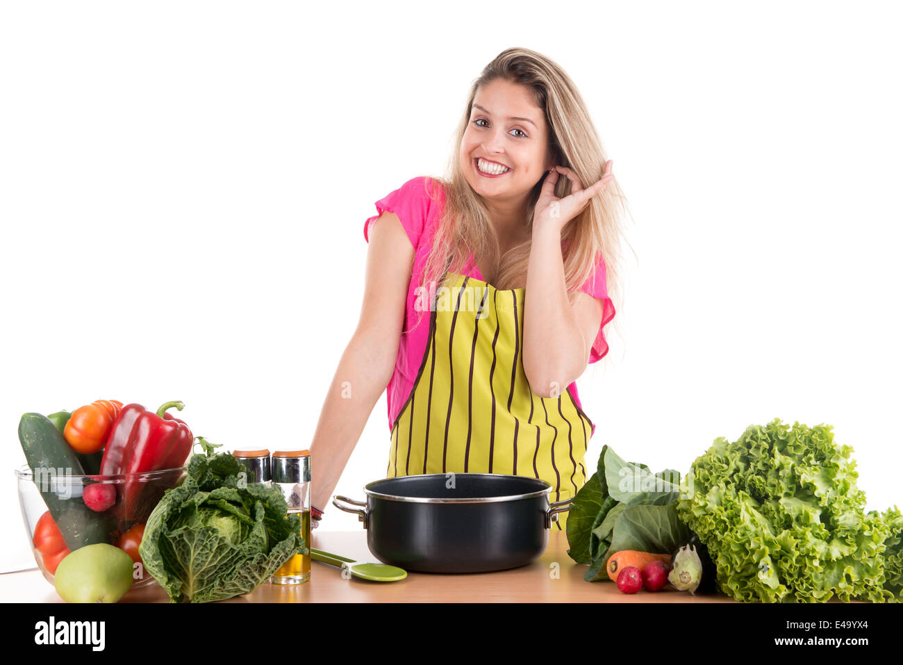 Beautiful woman cooking isolated in white Stock Photo - Alamy