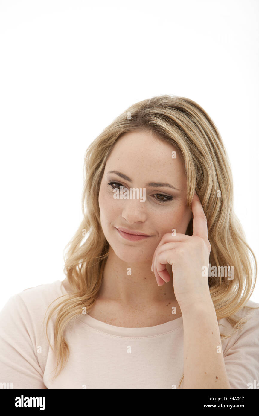 Attractive young woman wistful expression hi-res stock photography and ...