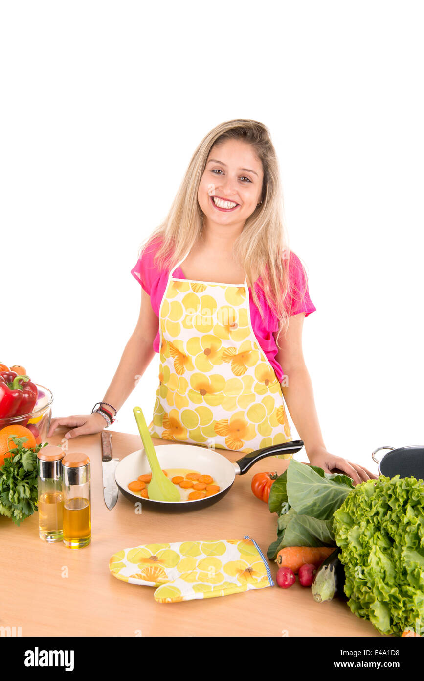 Beautiful woman cooking in the kitchen Stock Photo - Alamy