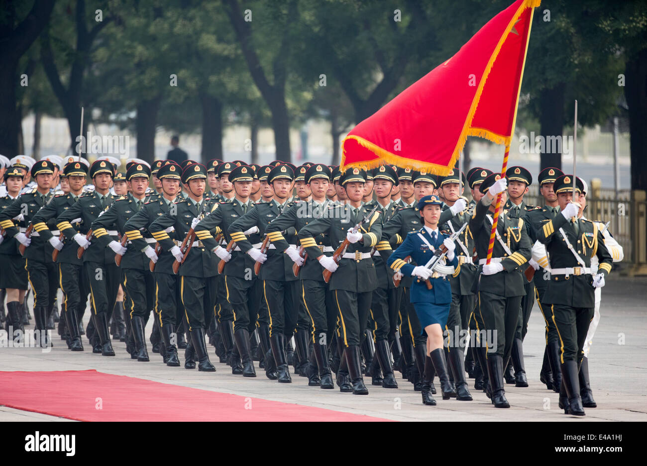 A Chinese honor guard marches prior the arrival of German Chancellor ...