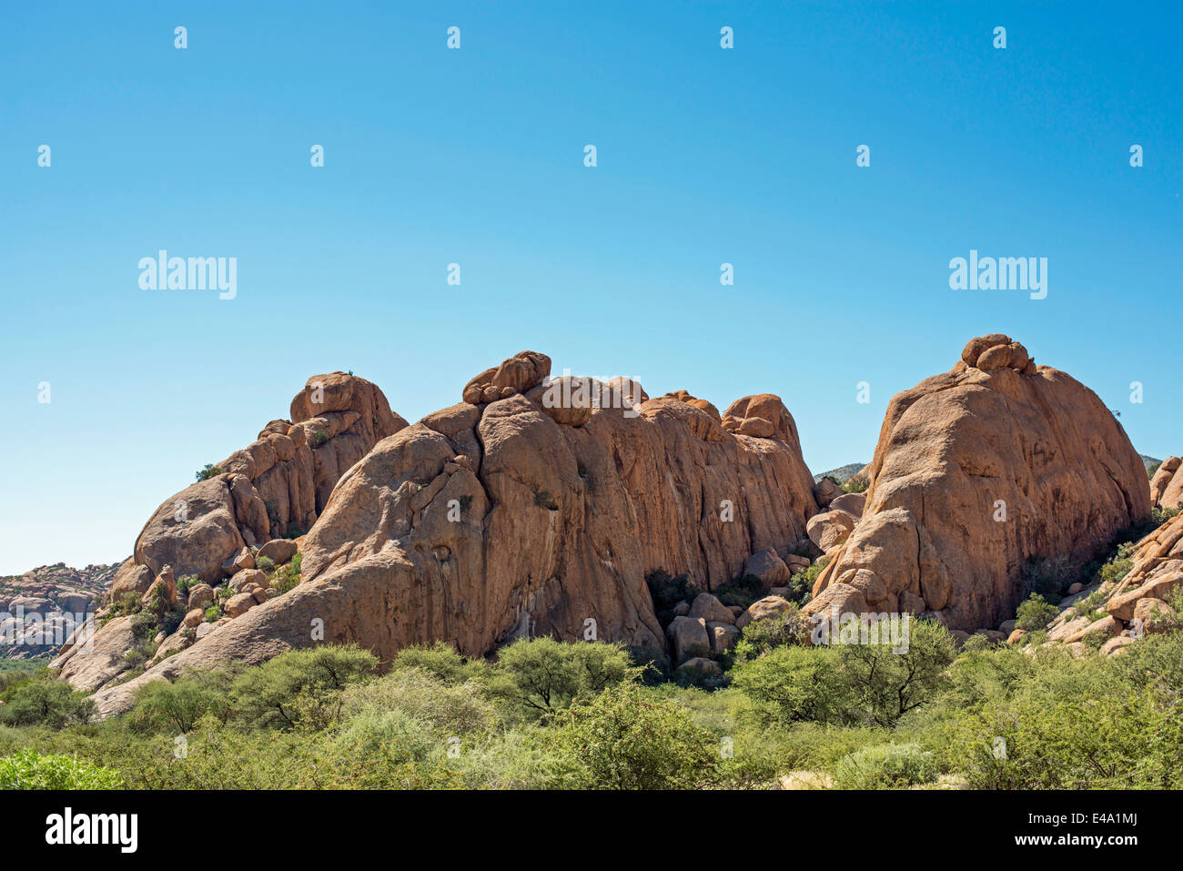 Africa, Namibia, Erongo mountains, three granite rocks formed like ...