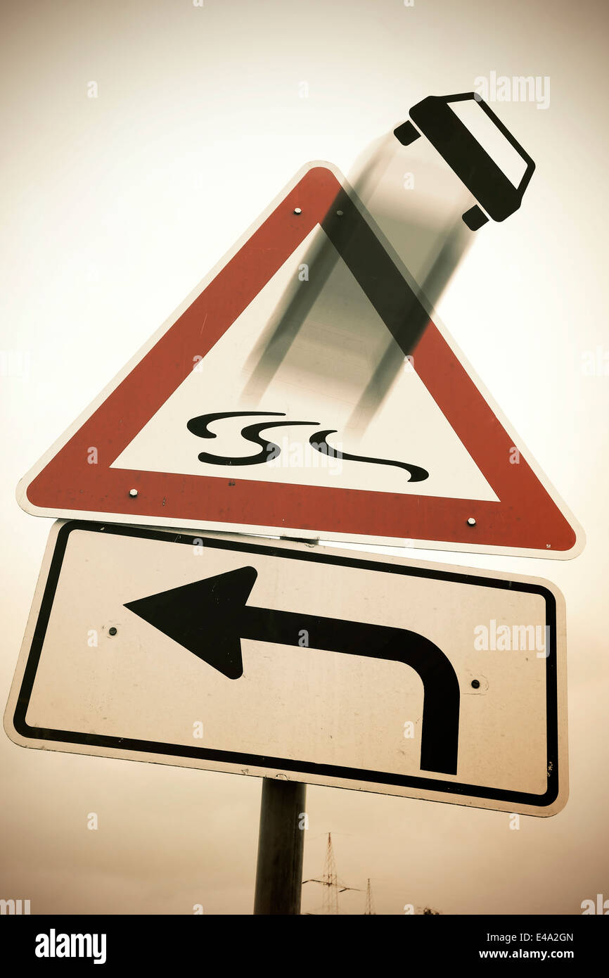 Germany, Road signs, Car loosing control on slippery road Stock Photo ...