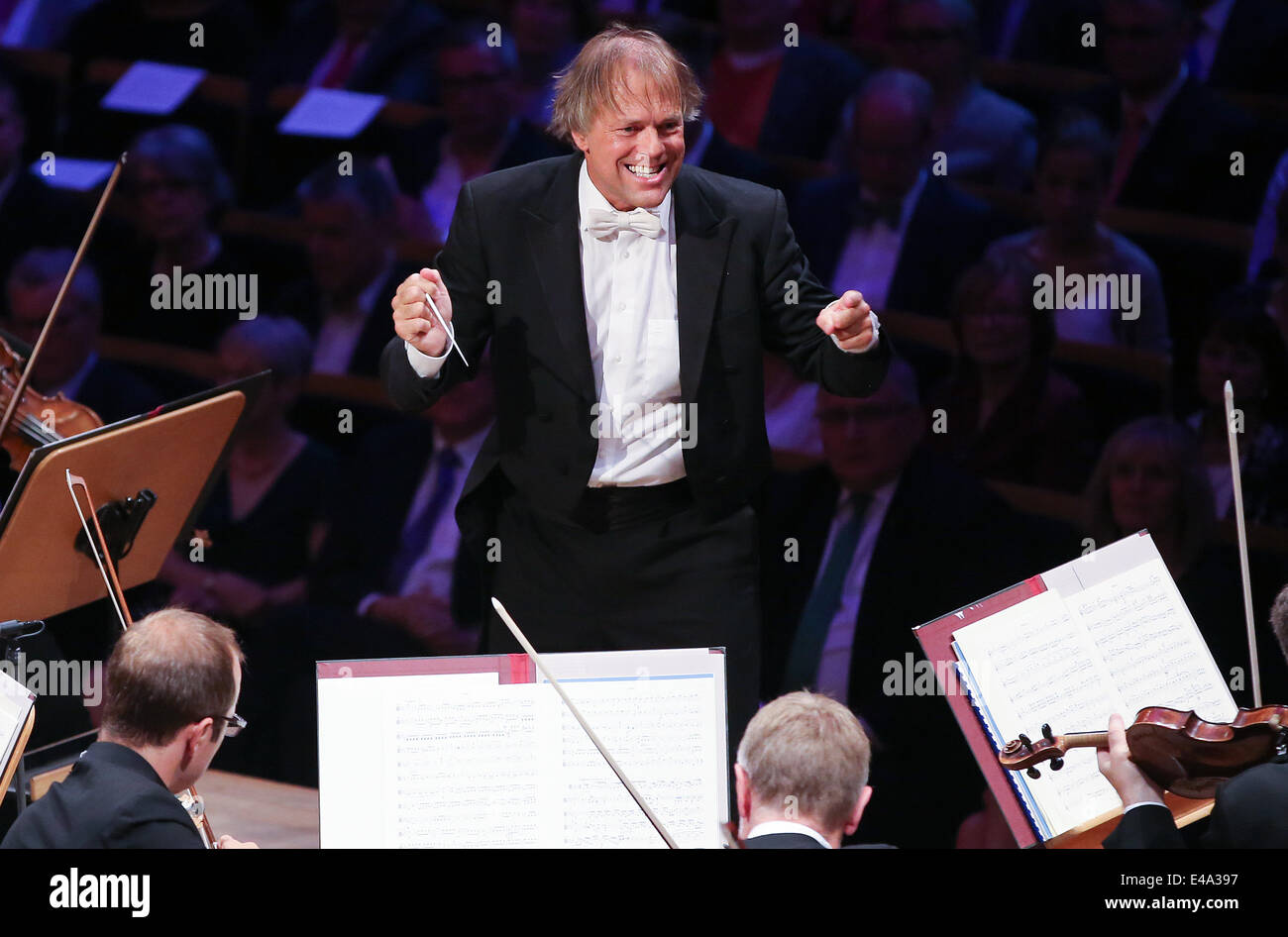 German conductor Thomas Hengelbrock performs with a symphony orchestra ...