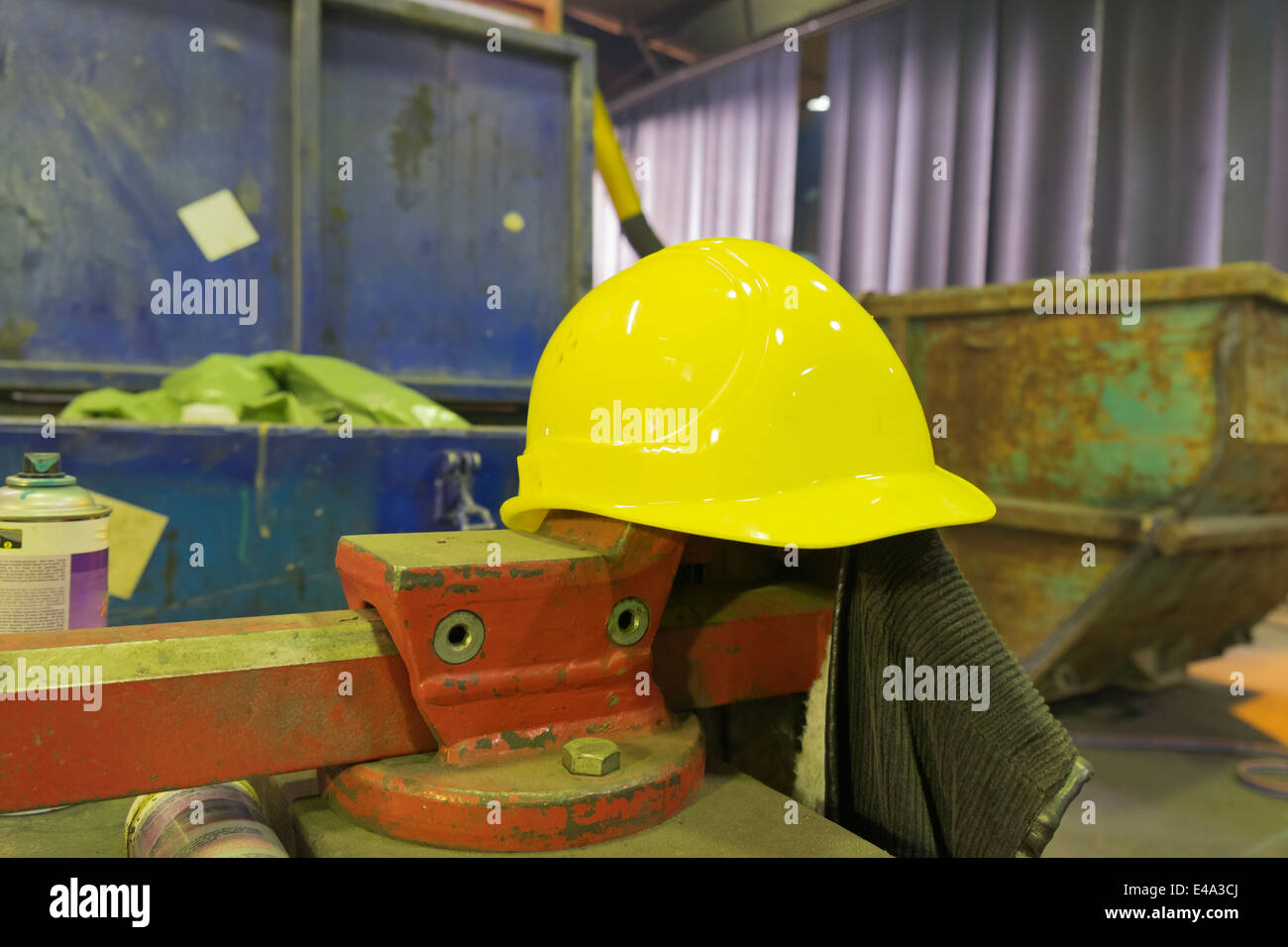 Helmet in a scrap metal recycling plant Stock Photo - Alamy