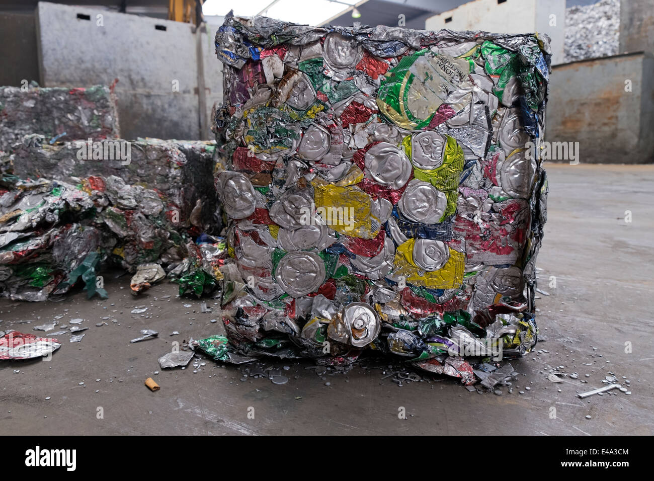 Compressed cans in a scrap metal recycling plant Stock Photo - Alamy